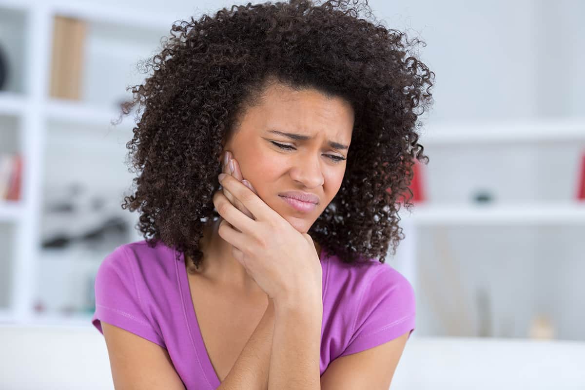 How A Popping Jaw May Relate To TMJ Disorder - West Orange